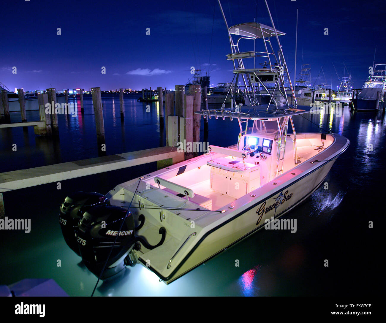 Beautiful sport fishing boat photographed at night Stock Photo - Alamy