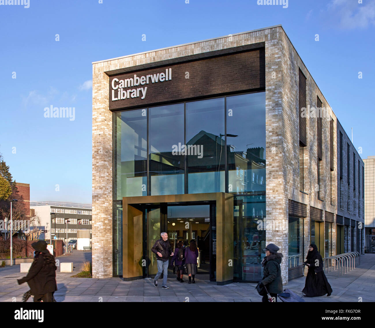 Overall exterior view with passing figures. Camberwell Library, London ...