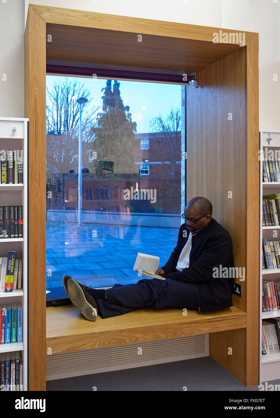 Interior view showing recessed window seat with man reading. Camberwell ...
