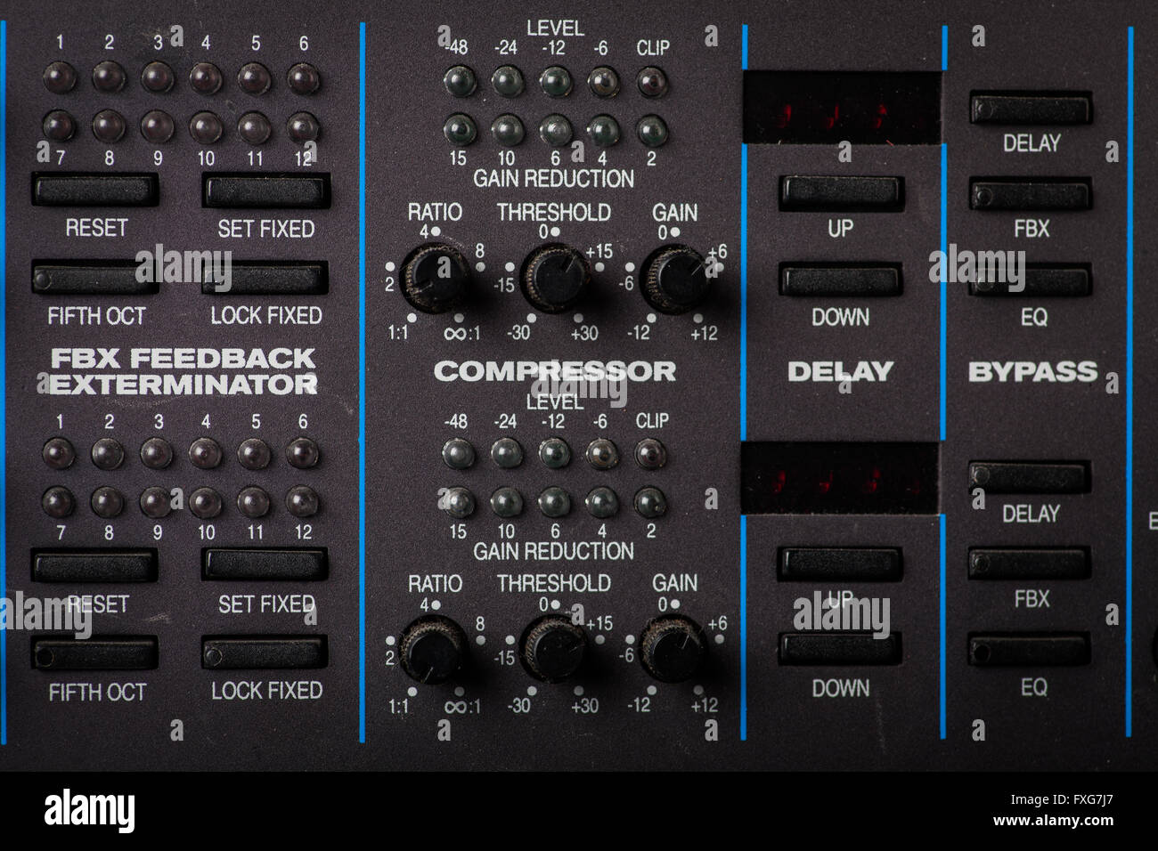 Color image of many buttons on a sound mixer in a recording studio ...