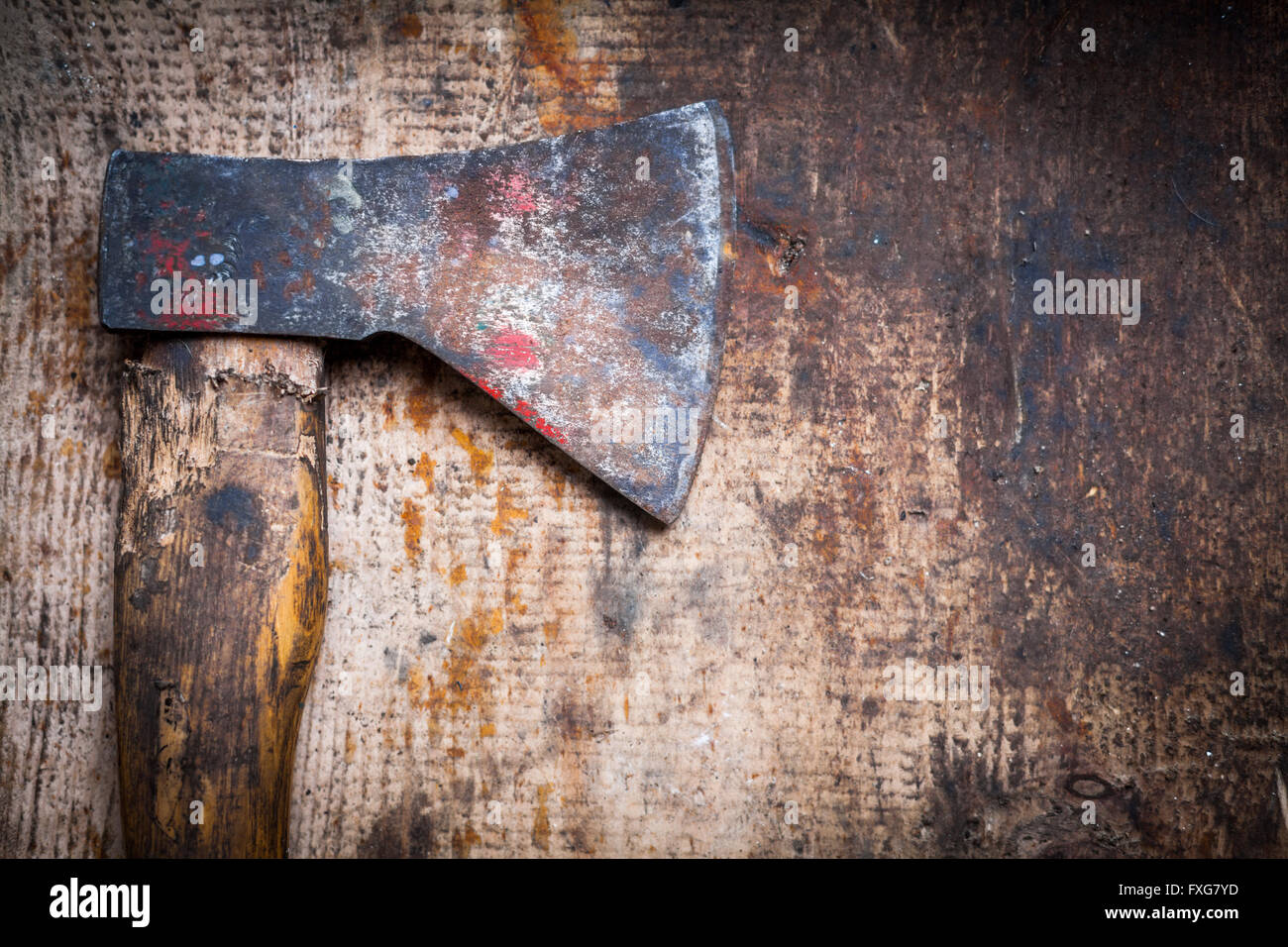 Color image of an axe on a wooden plank Stock Photo - Alamy