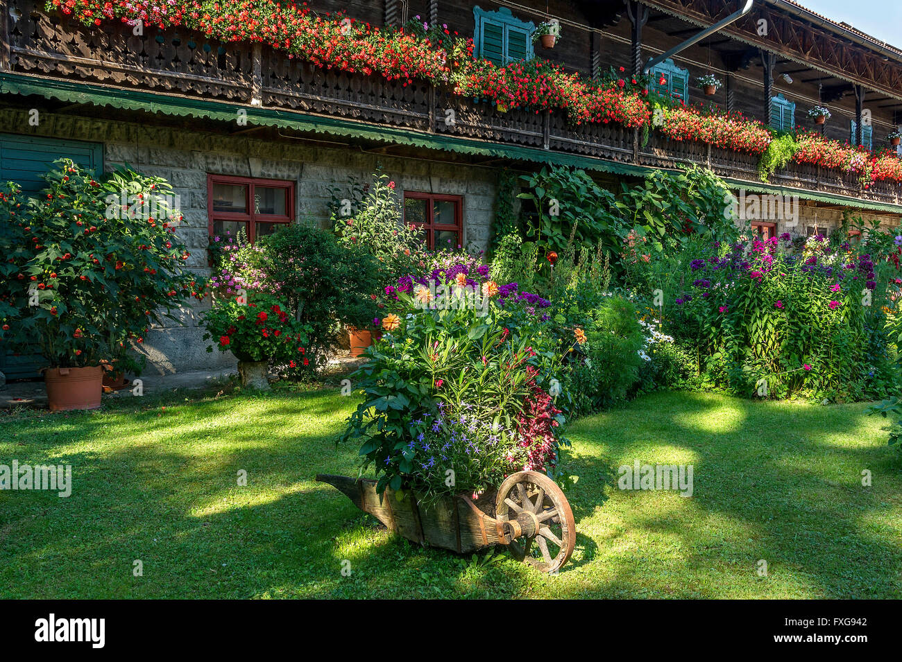 Wooden balcony geraniums hi-res stock photography and images - Alamy