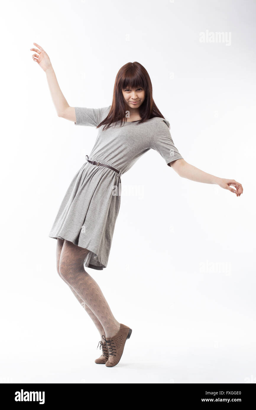 beautiful girl in motion on white backround Stock Photo - Alamy