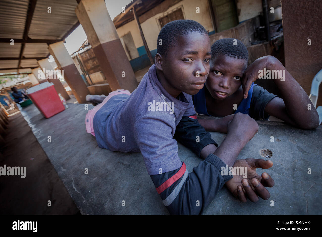 Mozambique,Africa, poor boys in fruit market Stock Photo - Alamy