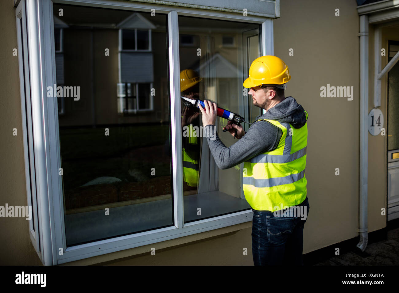 Pest control man using pest control injection Stock Photo - Alamy