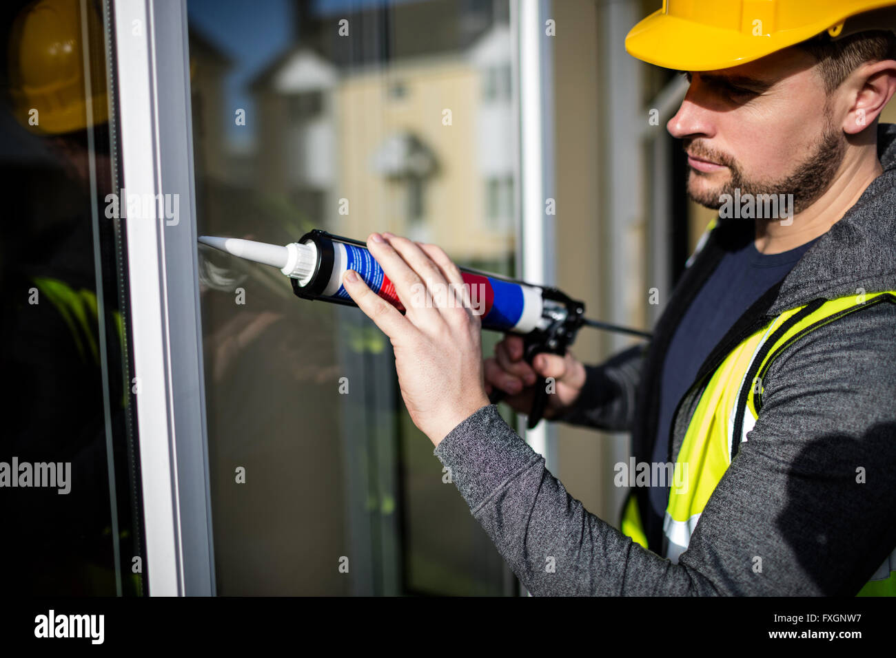 Pest control man using pest control injection Stock Photo - Alamy