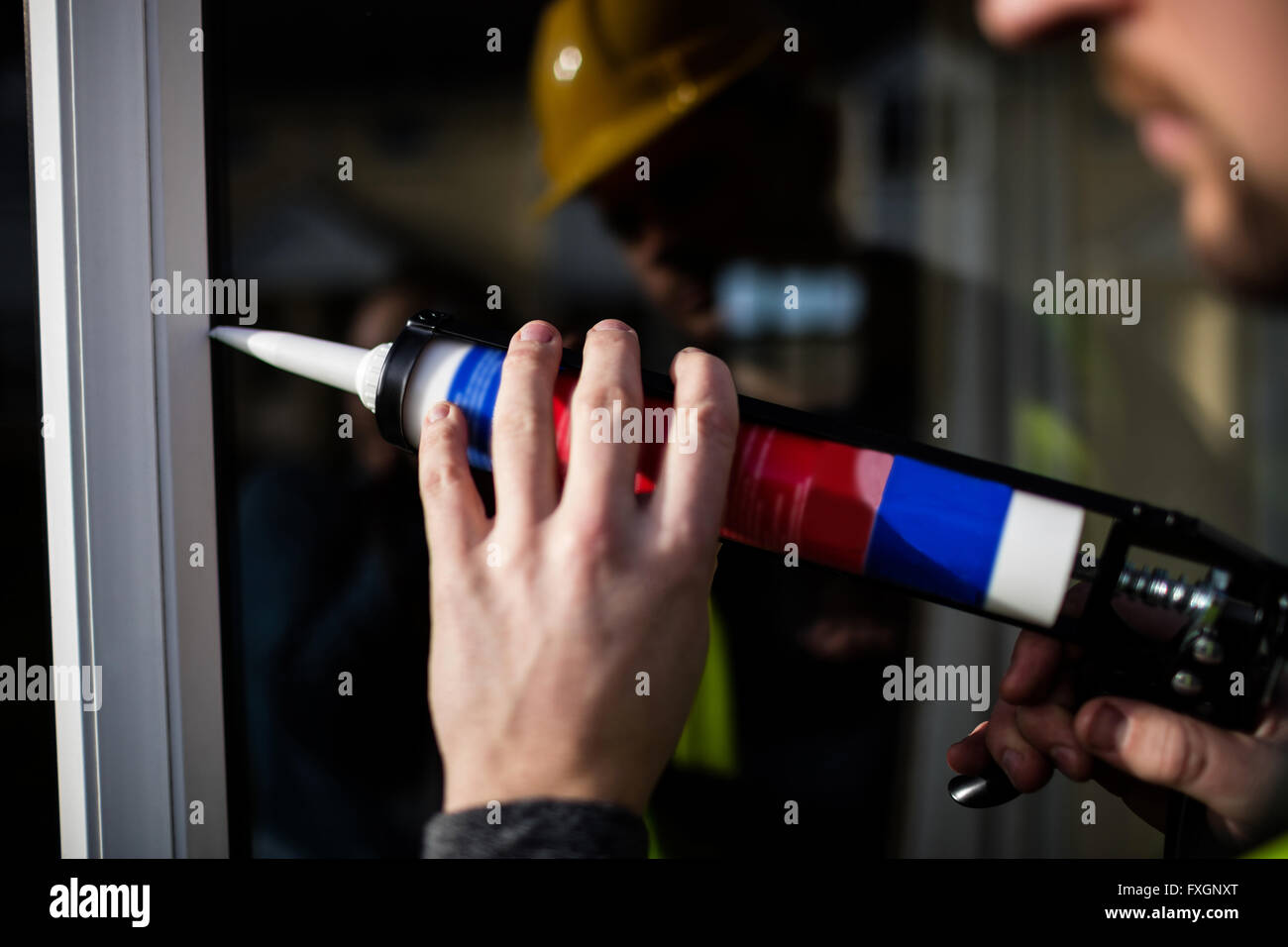 Pest control man using pest control injection Stock Photo - Alamy