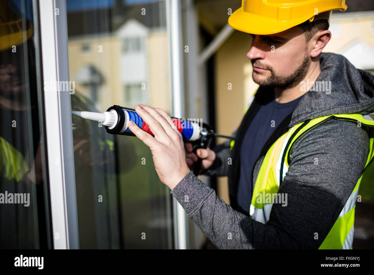 Pest control man using pest control injection Stock Photo - Alamy