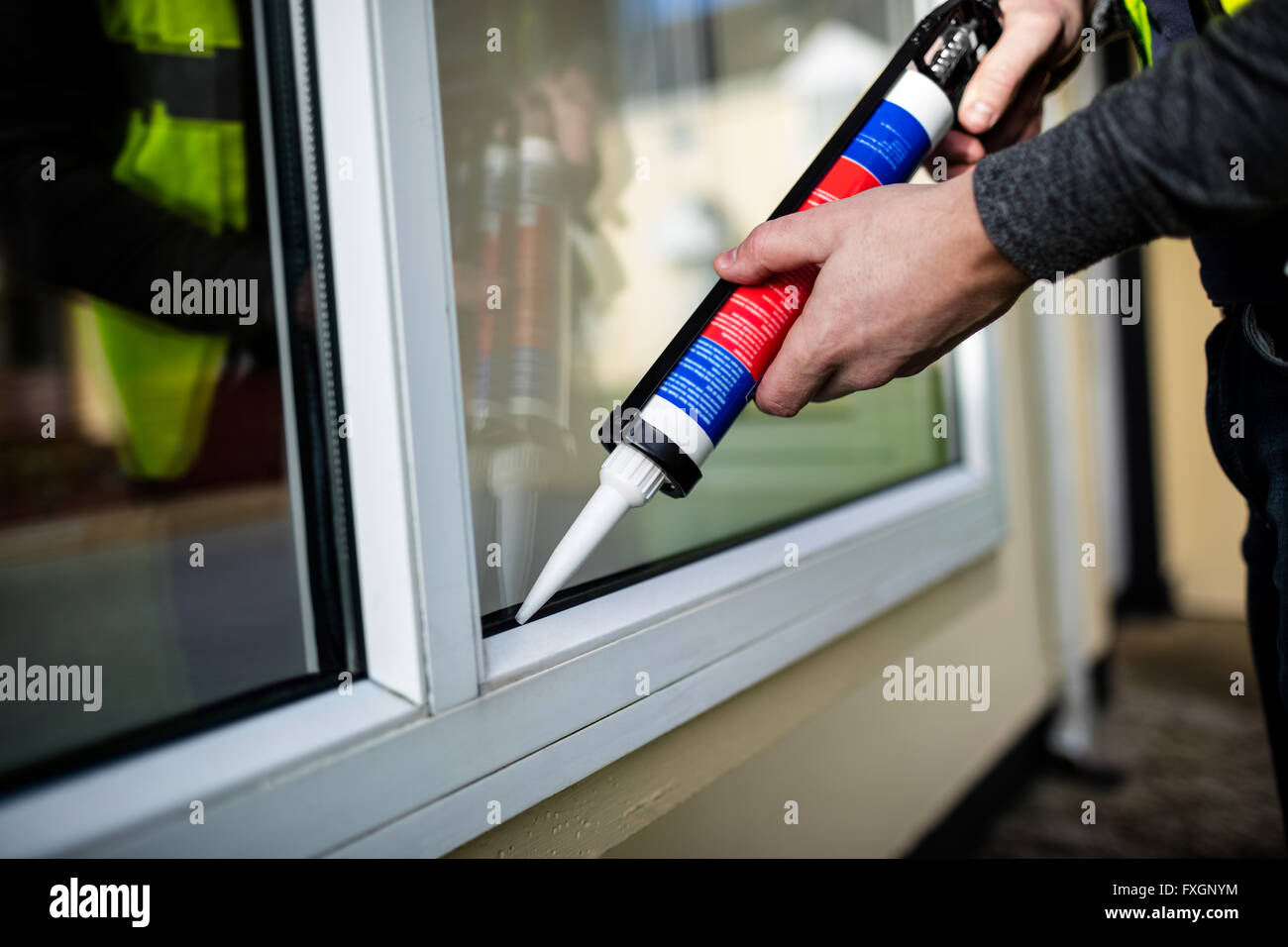 Mid-section of man using pest control injection Stock Photo - Alamy
