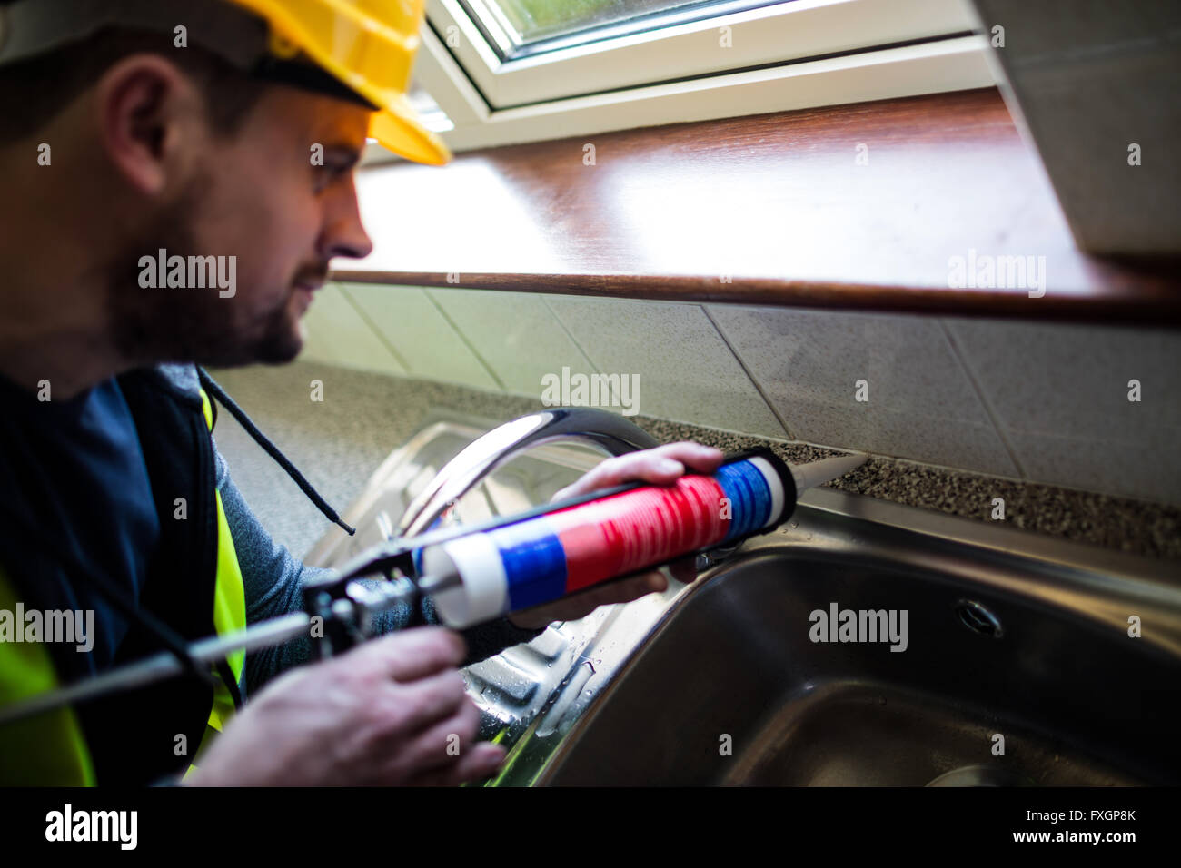 Pest control man using pest control injection Stock Photo - Alamy