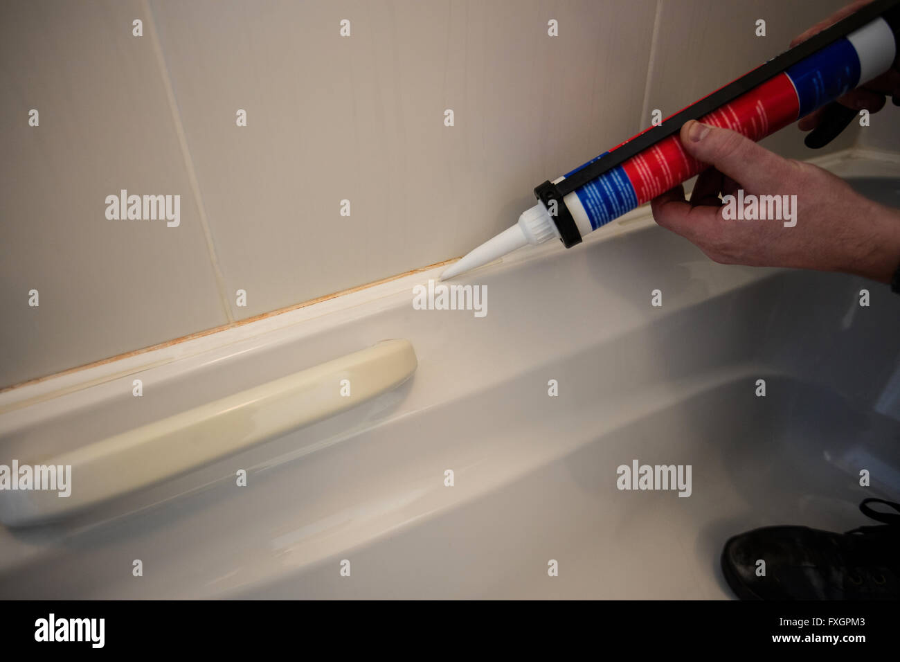 Man using pest control injection Stock Photo - Alamy