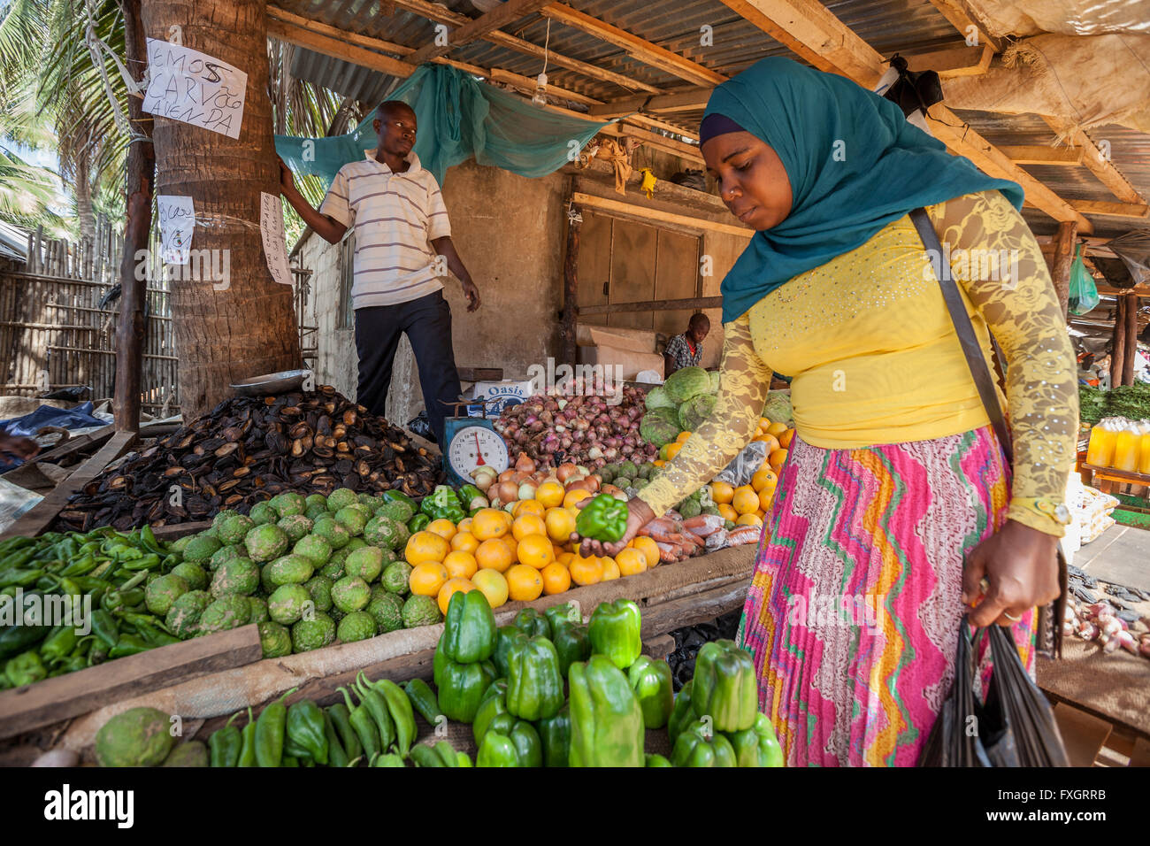 Mozambique, a man is selling vegetables in the street market Stock ...