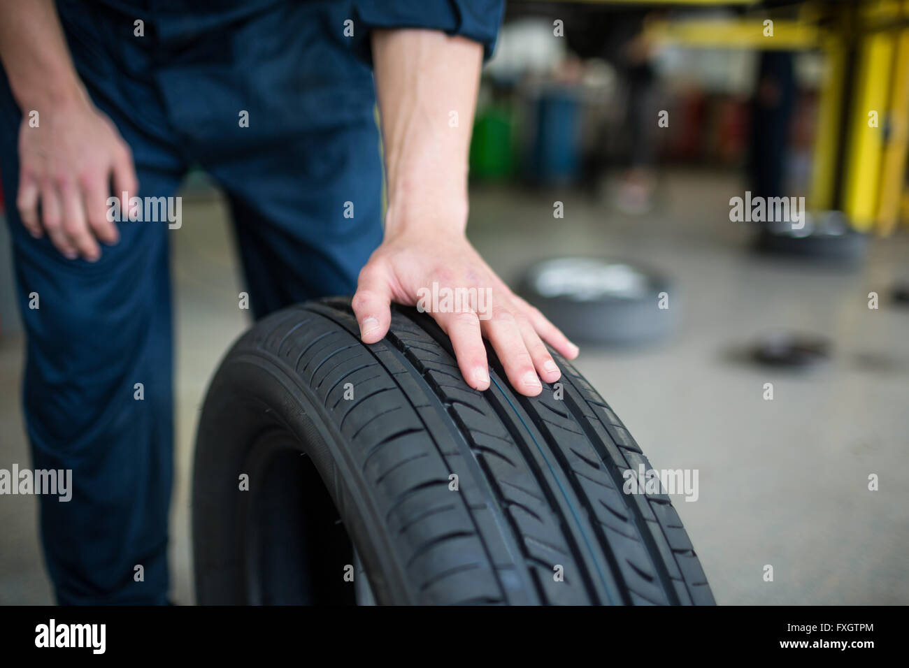 Replacement tyre hi-res stock photography and images - Alamy