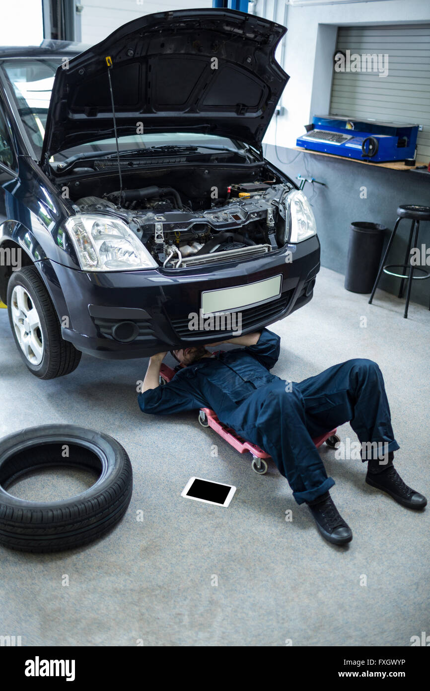 Mechanic repairing a car Stock Photo - Alamy