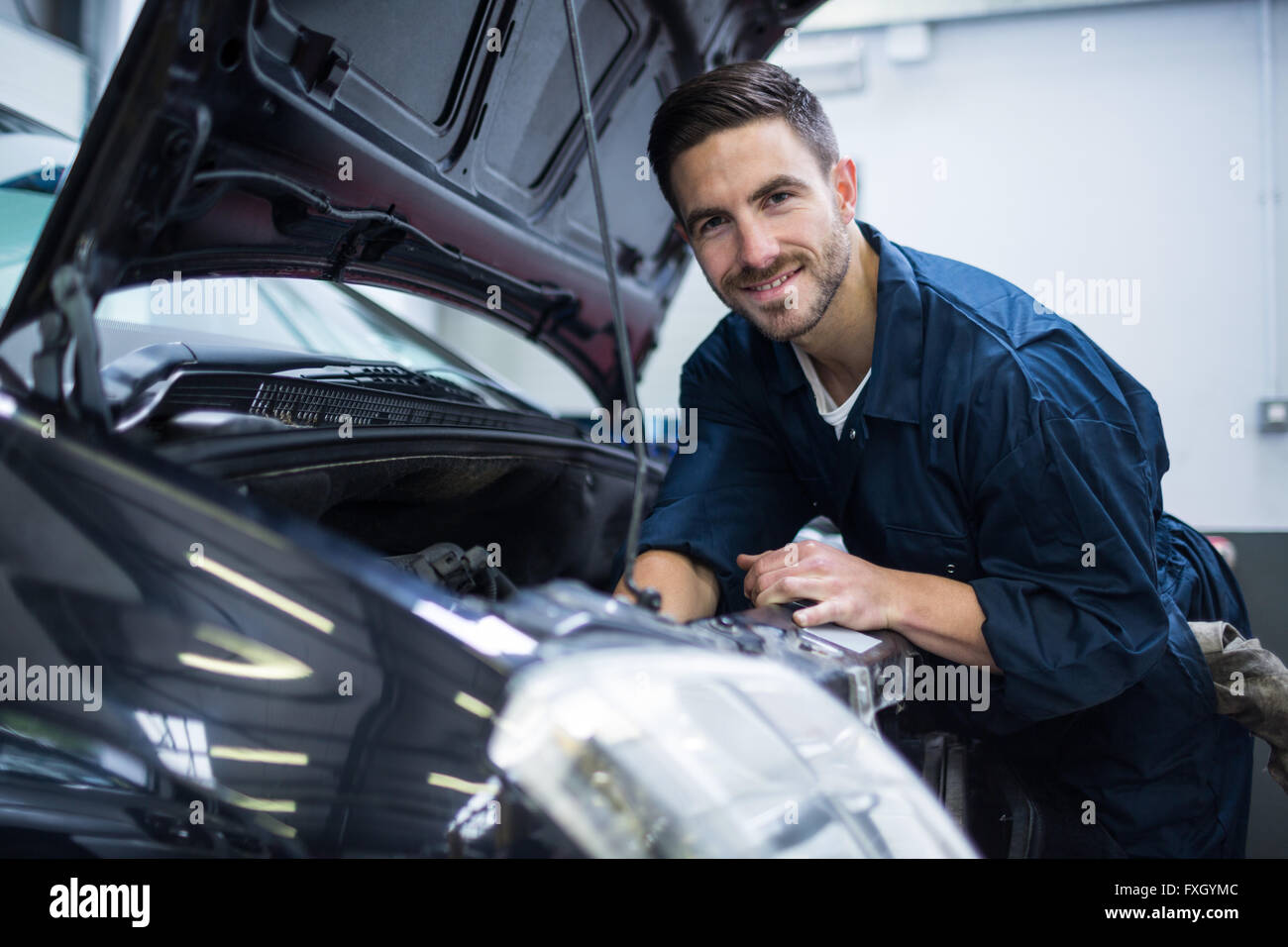Mechanic looking camera holding hi-res stock photography and images - Alamy