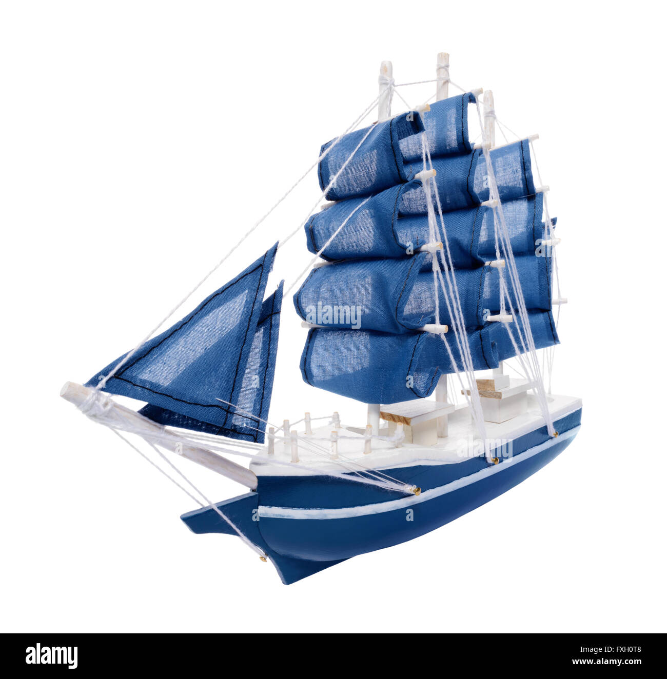 Isolated objects: blue sailboat with blue sails, generic scale model ...