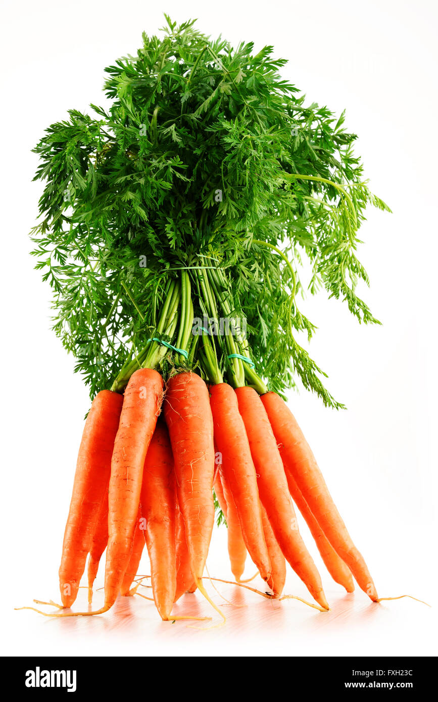 Fresh carrots bunch isolated on white background Stock Photo - Alamy