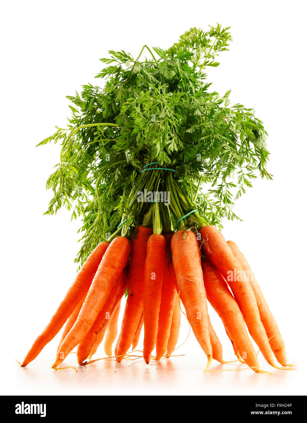 Fresh carrots bunch isolated on white background Stock Photo - Alamy