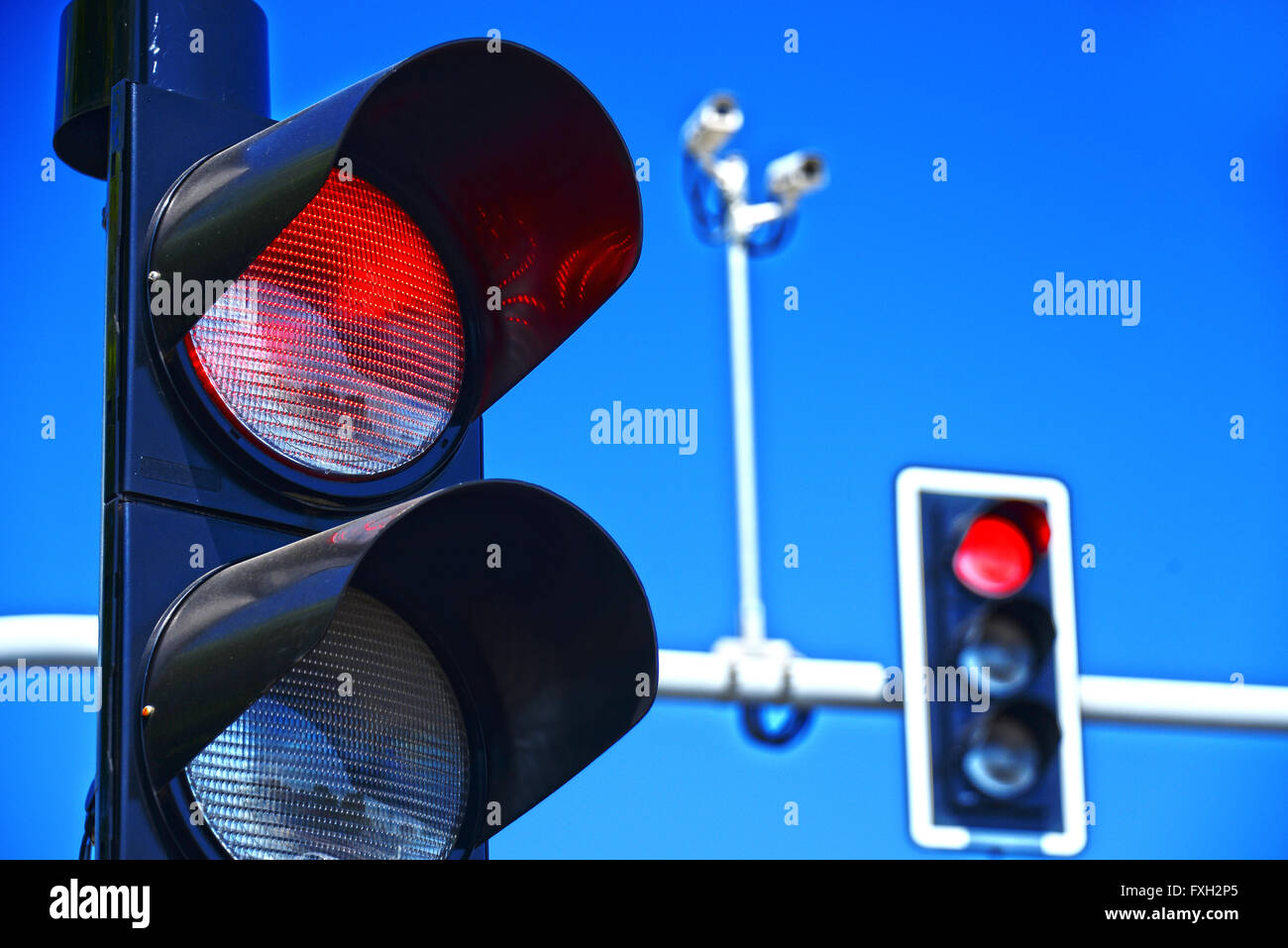 Traffic lights over blue sky Stock Photo - Alamy