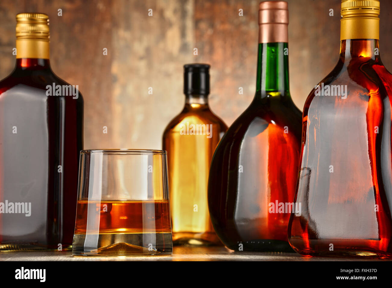 Bottles of assorted alcoholic beverages Stock Photo - Alamy