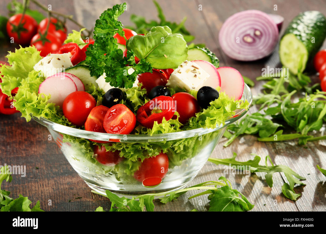 Vegetable salad bowl on kitchen table. Balanced diet Stock Photo - Alamy