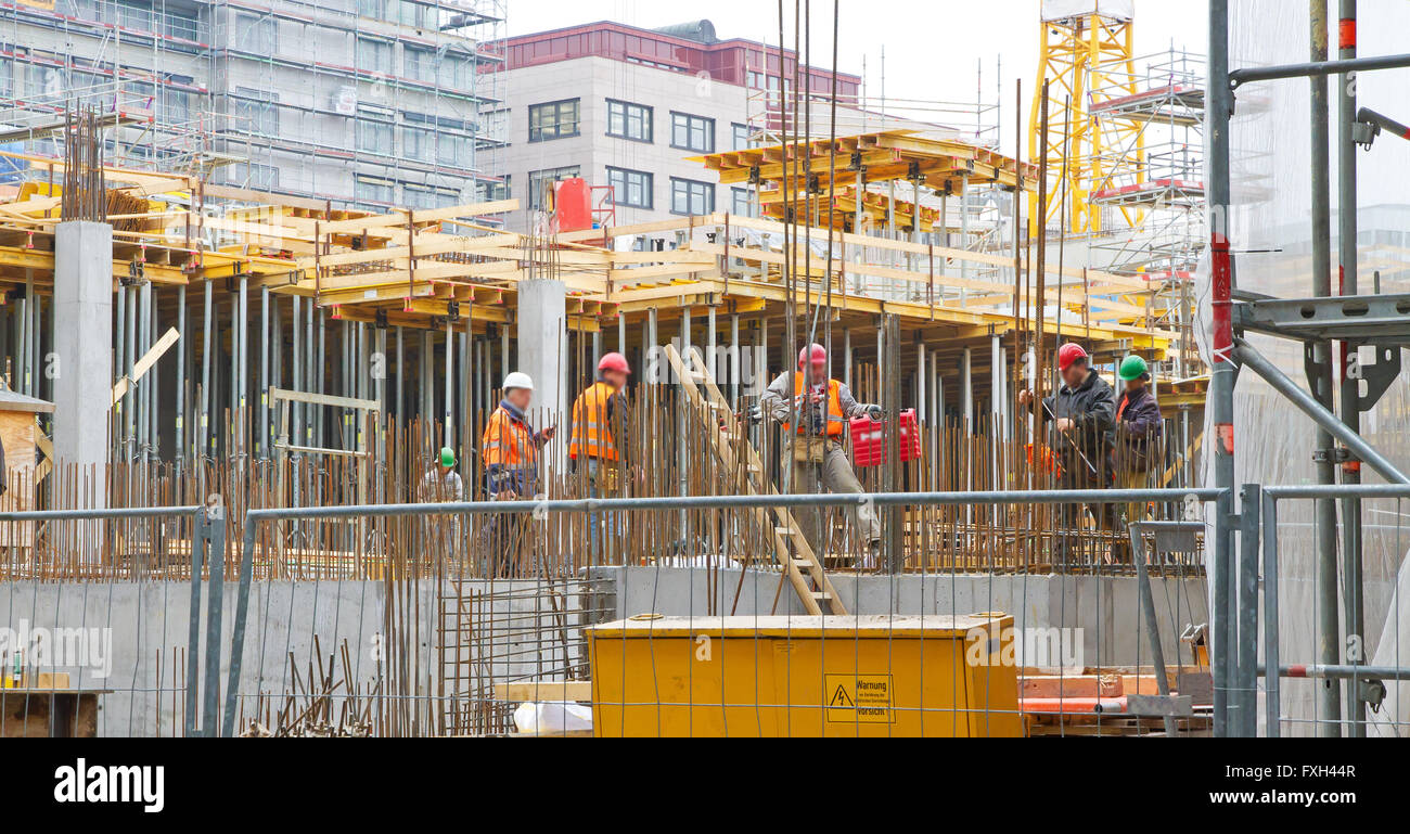 Construction site in a town Stock Photo - Alamy