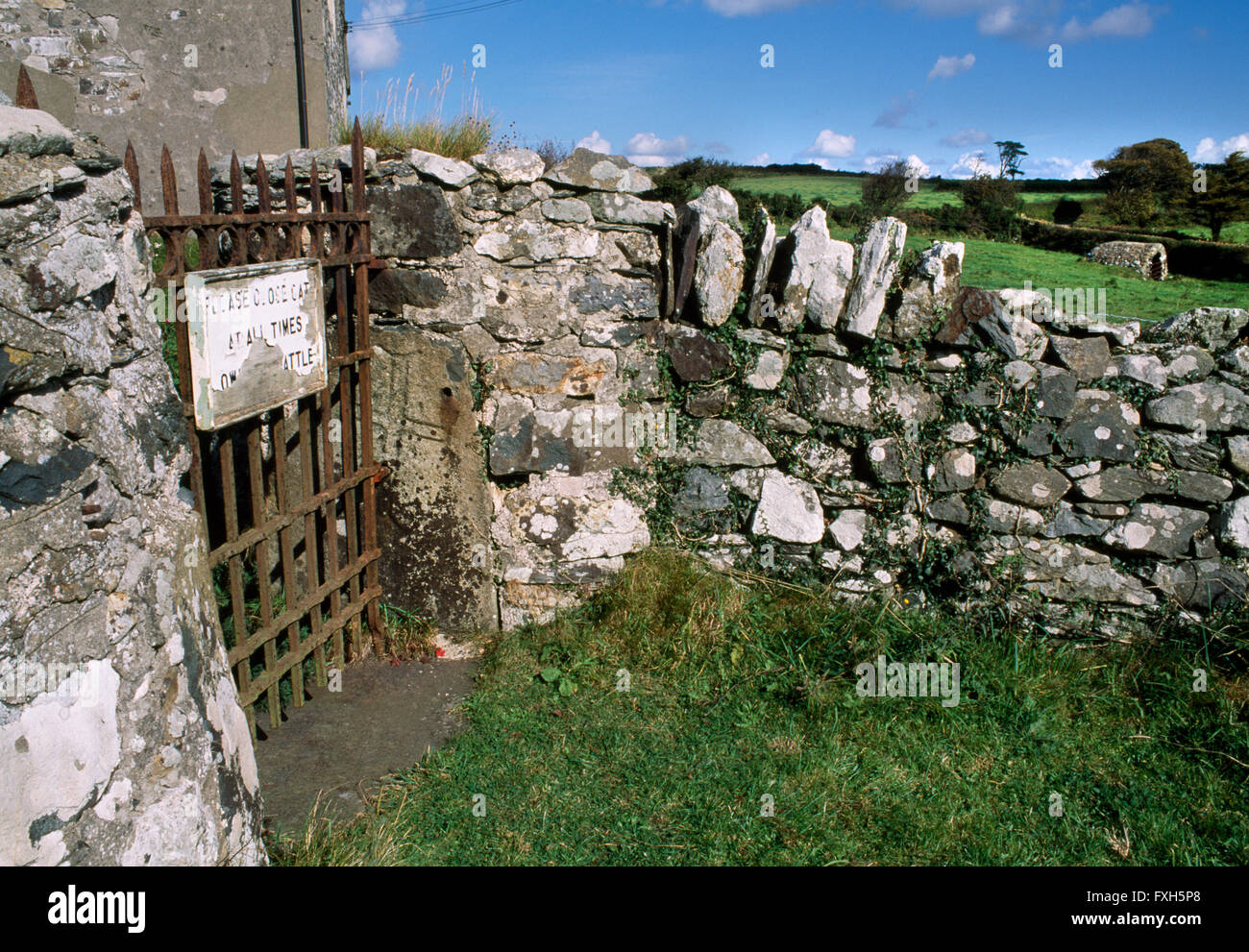 An C8th cross-inscribed stone reused as a gatepost at Llanllawer church ...