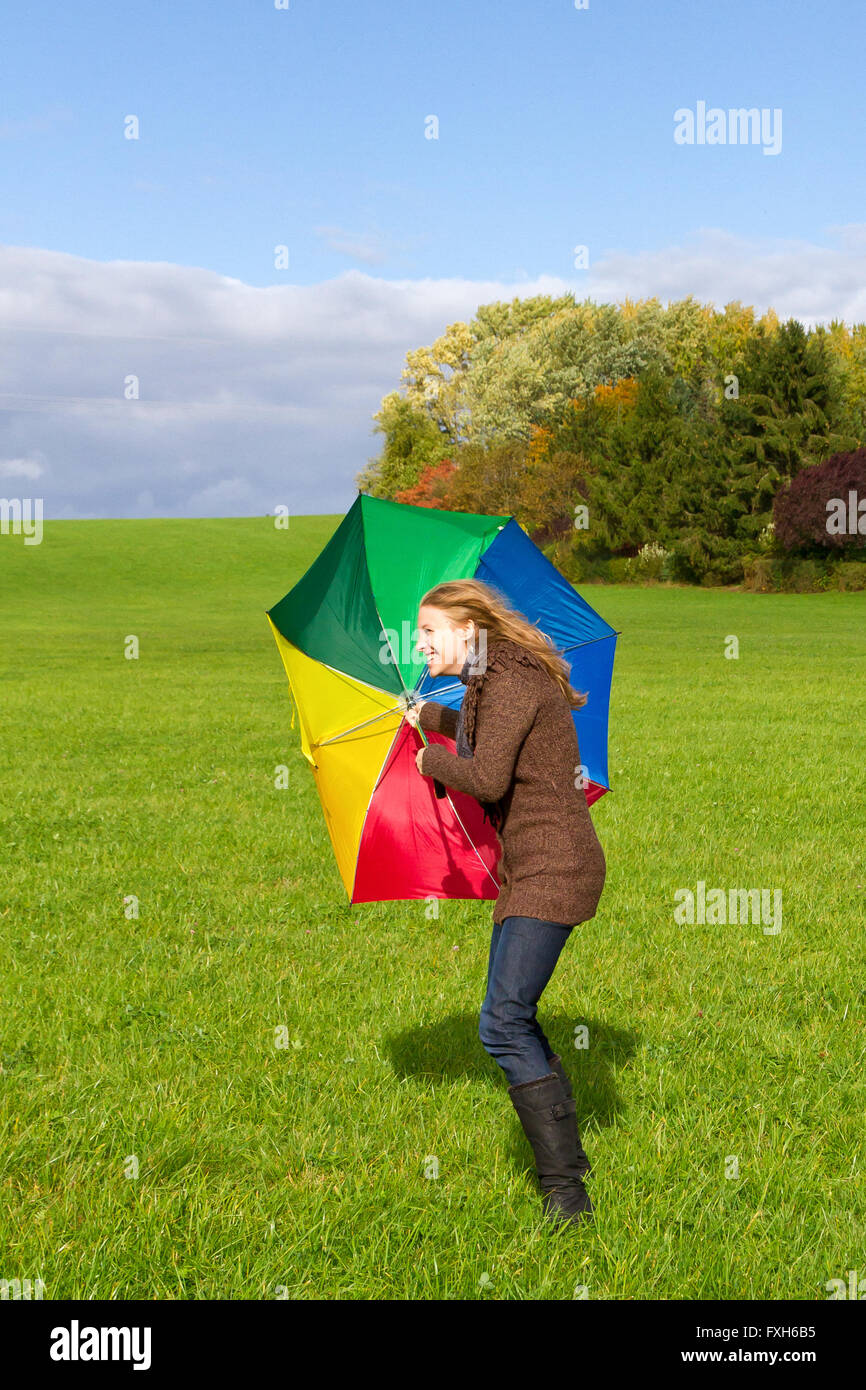 Woman umbrella rain storm hi-res stock photography and images - Alamy