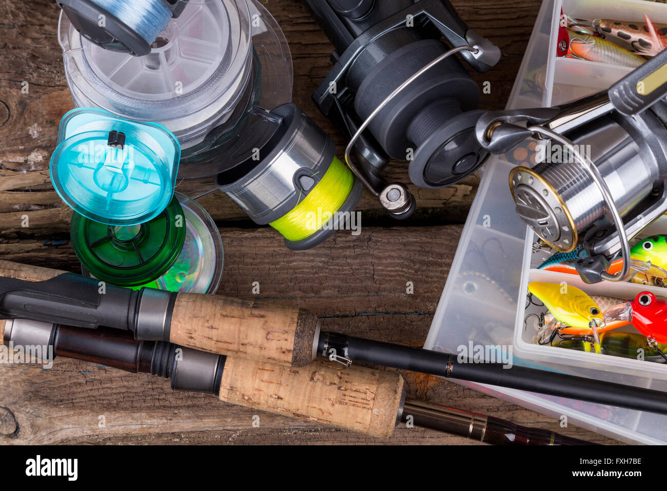 fishing tackles on vertical wooden board background. Concept design for ...
