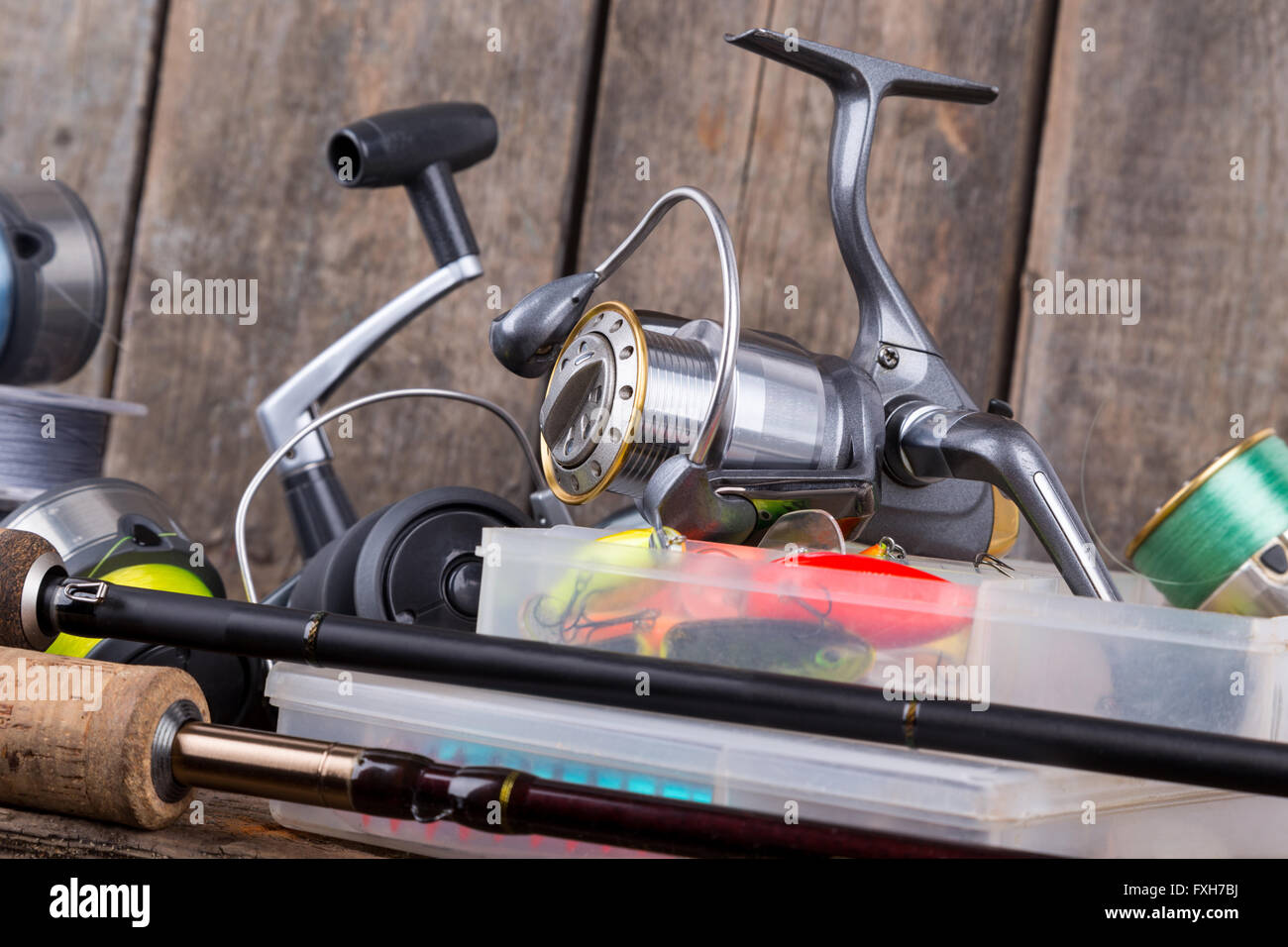 fishing tackles on vertical wooden board background. Concept design for ...
