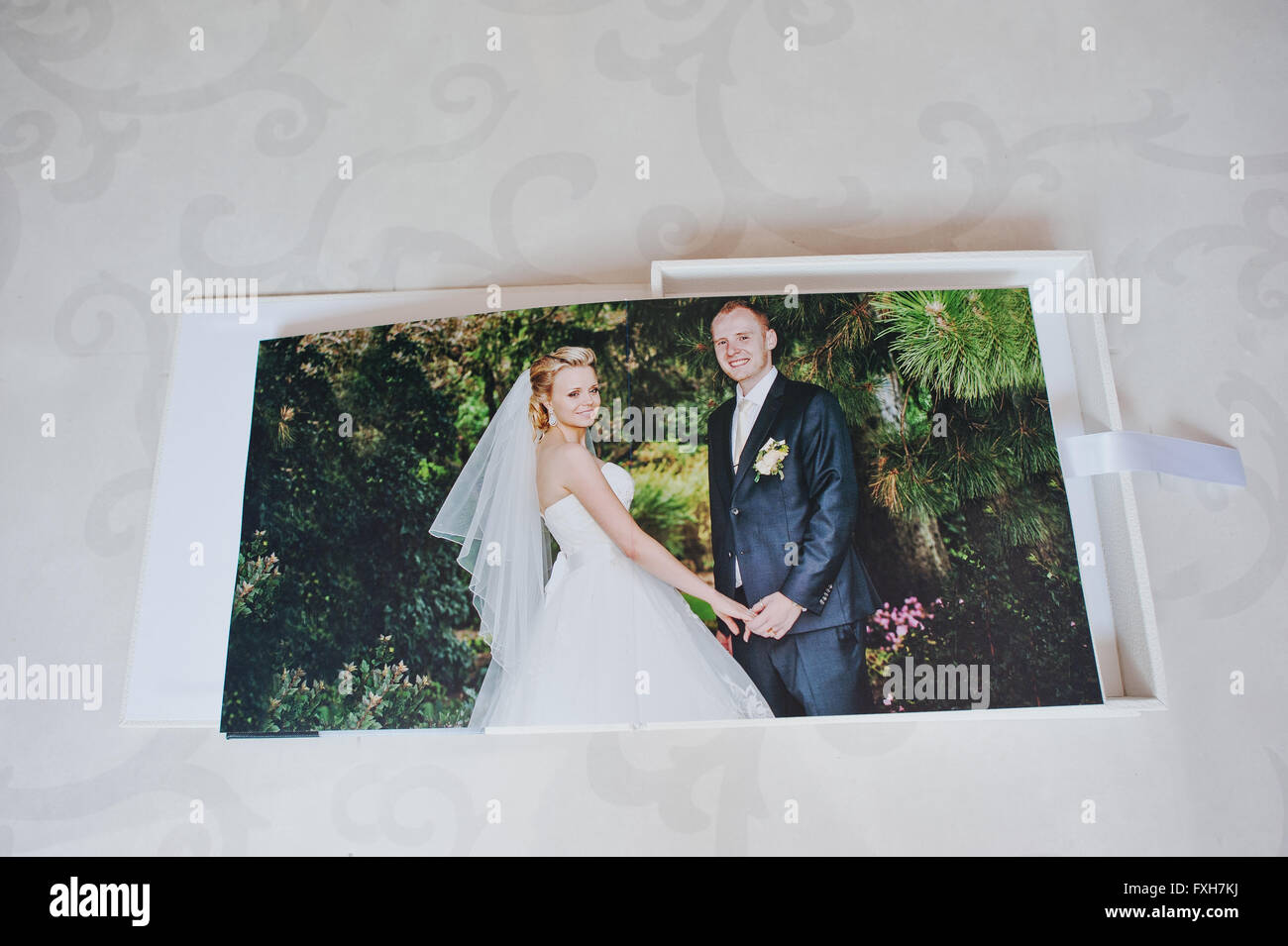 Dual pages of wedding photo book with wedding couple Stock Photo - Alamy
