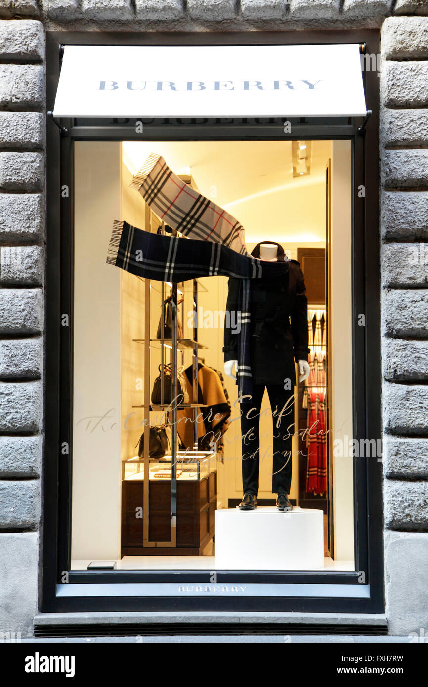Boutique window with dressed mannequin at Via dei Condotti in Rome ...