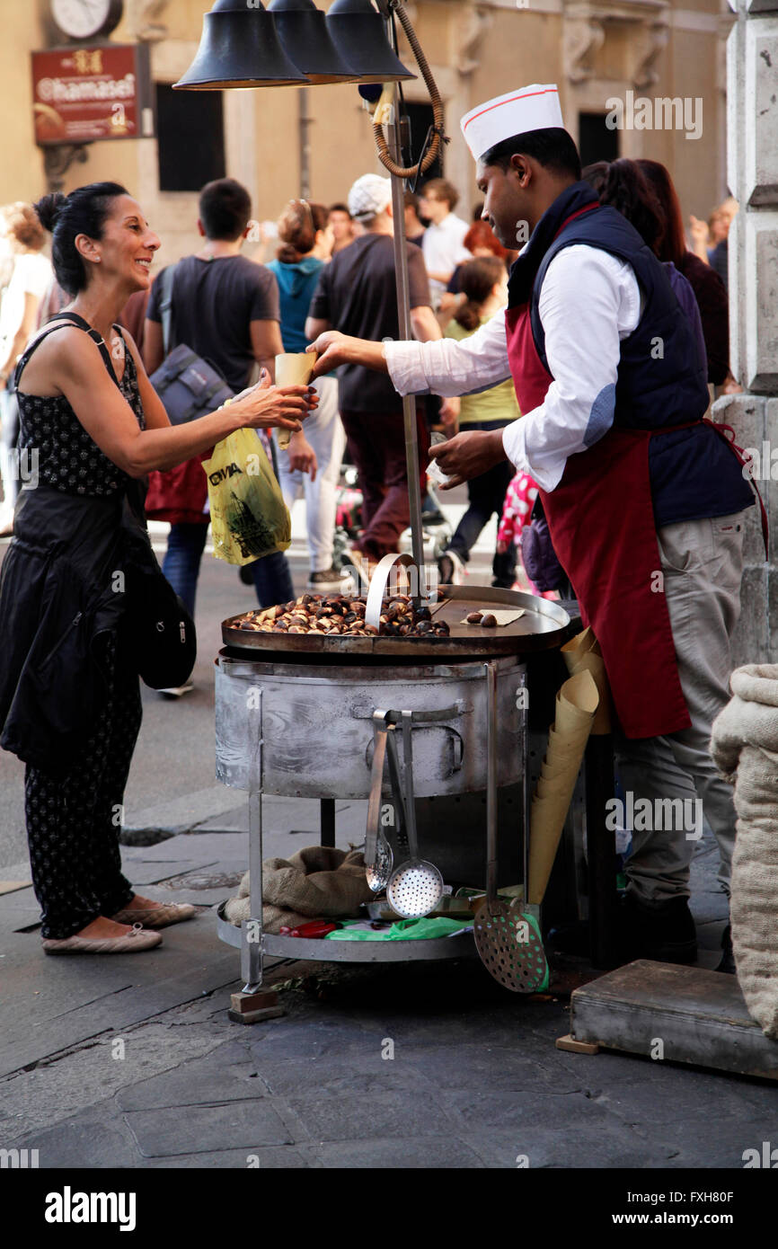 Roasted chestnuts seller hi-res stock photography and images - Alamy
