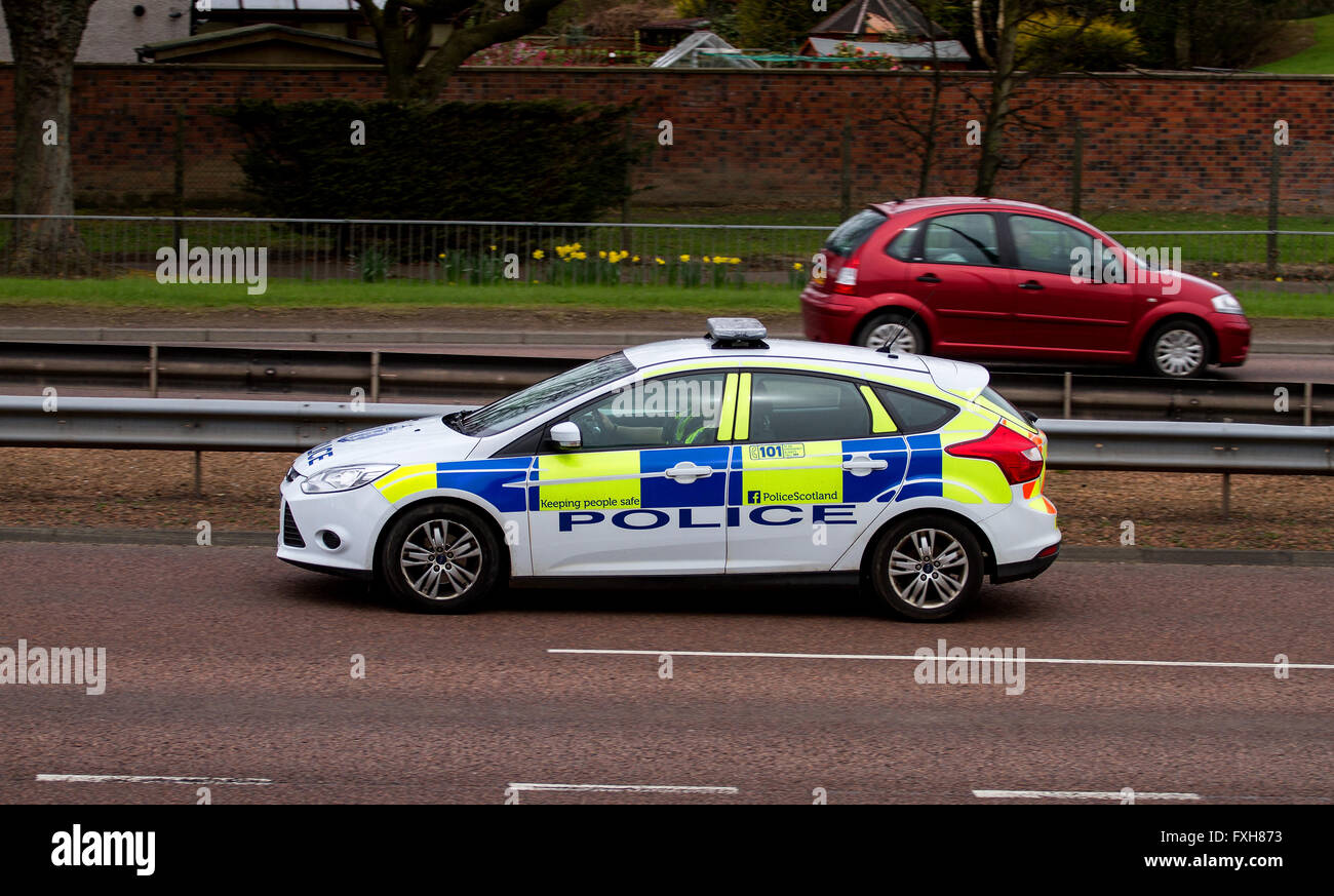 A "Police Scotland" Police Car travelling along the Kingsway West Dual ...