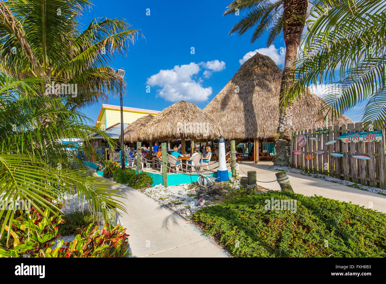 Thatched roof tropical Stump Pass Grill & Tiki Bar on Lemon Bay on the ...