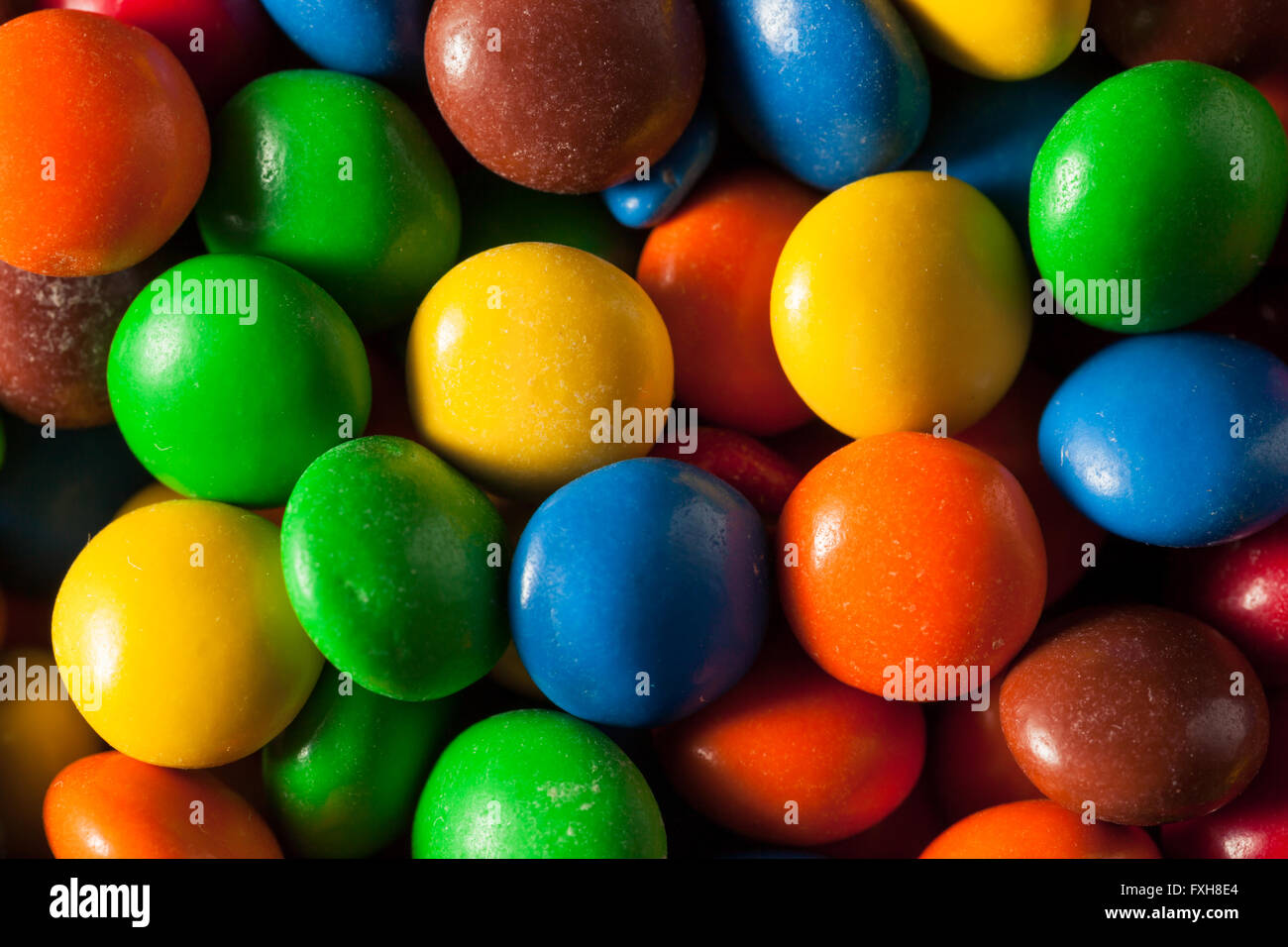 Rainbow Colorful Candy Coated Chocolate Pieces in a Bowl Stock Photo ...