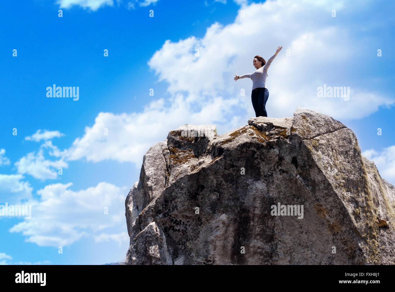 Woman on the mountain top feeling freedom and enjoying nature Stock ...