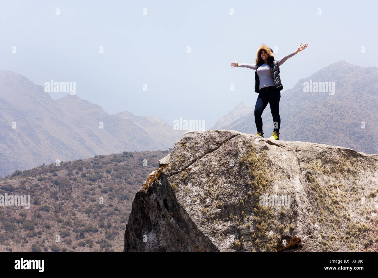 Woman on the mountain top feeling freedom and enjoying nature Stock ...
