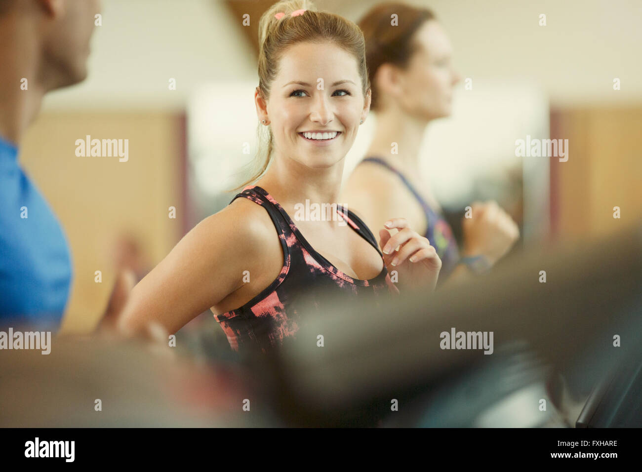 Three people smiling in a gym hi-res stock photography and images - Alamy