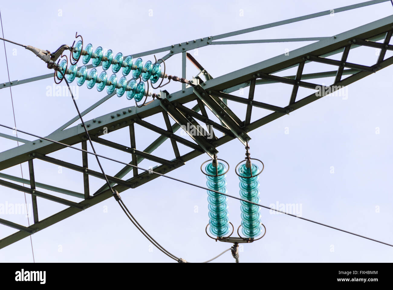 Traverse and insulators at a tension tower of a high-voltage line Stock ...