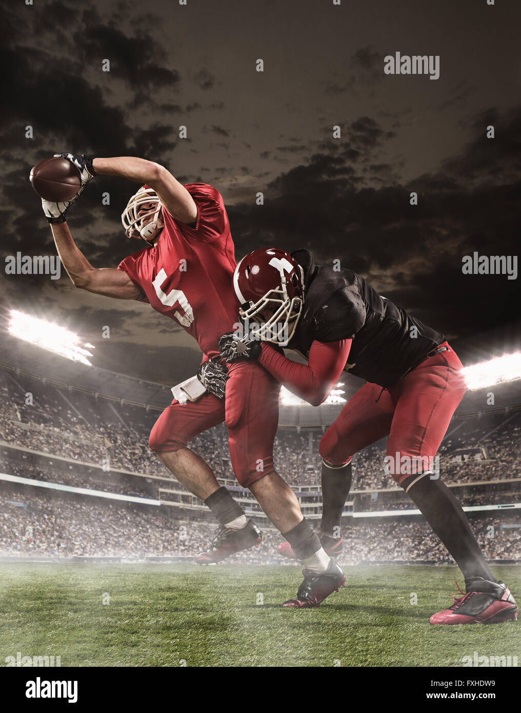 The american football players in action Stock Photo - Alamy