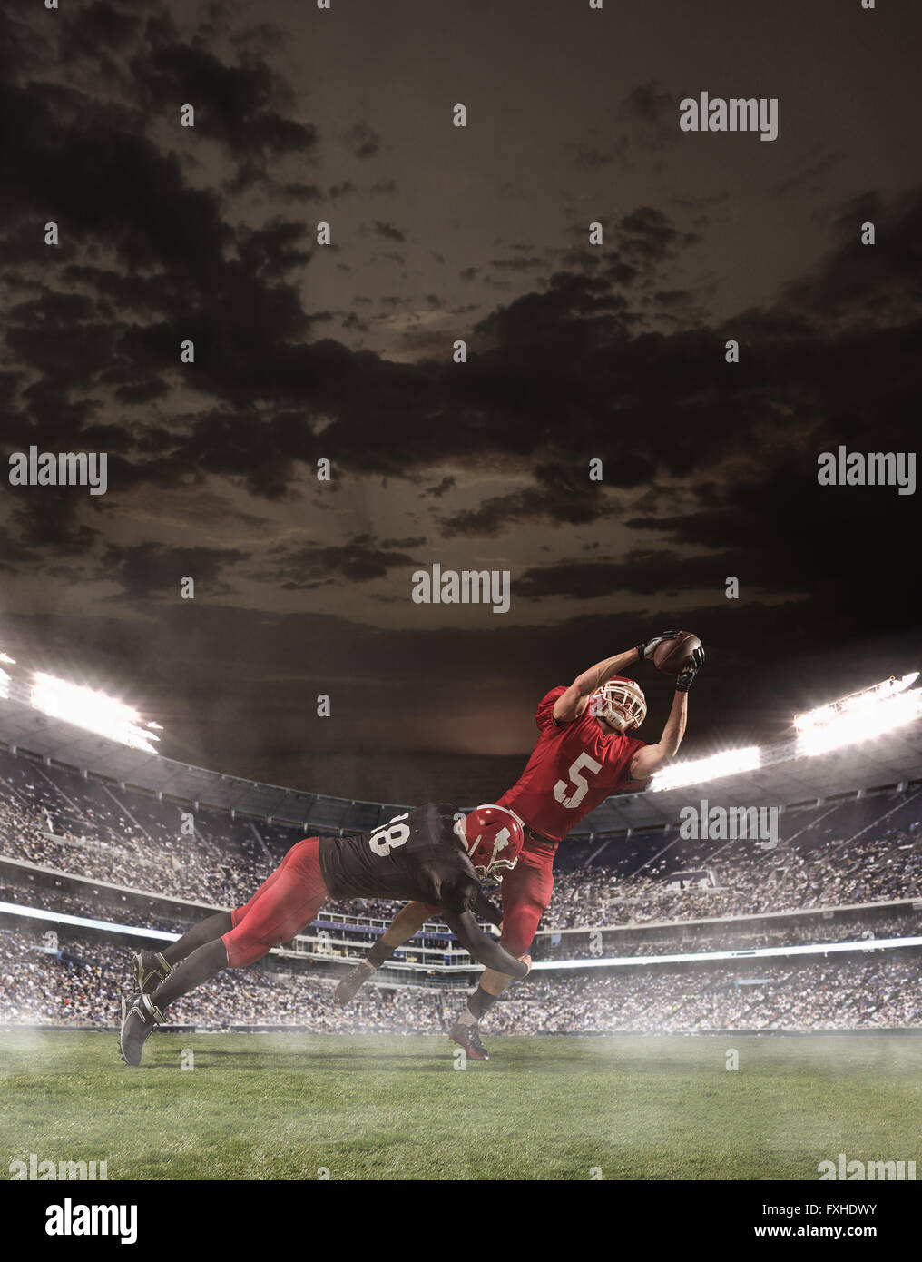 The american football players in action Stock Photo - Alamy