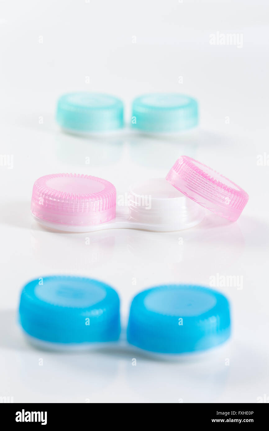 blue and pink plastic contacts case on the white background Stock Photo ...