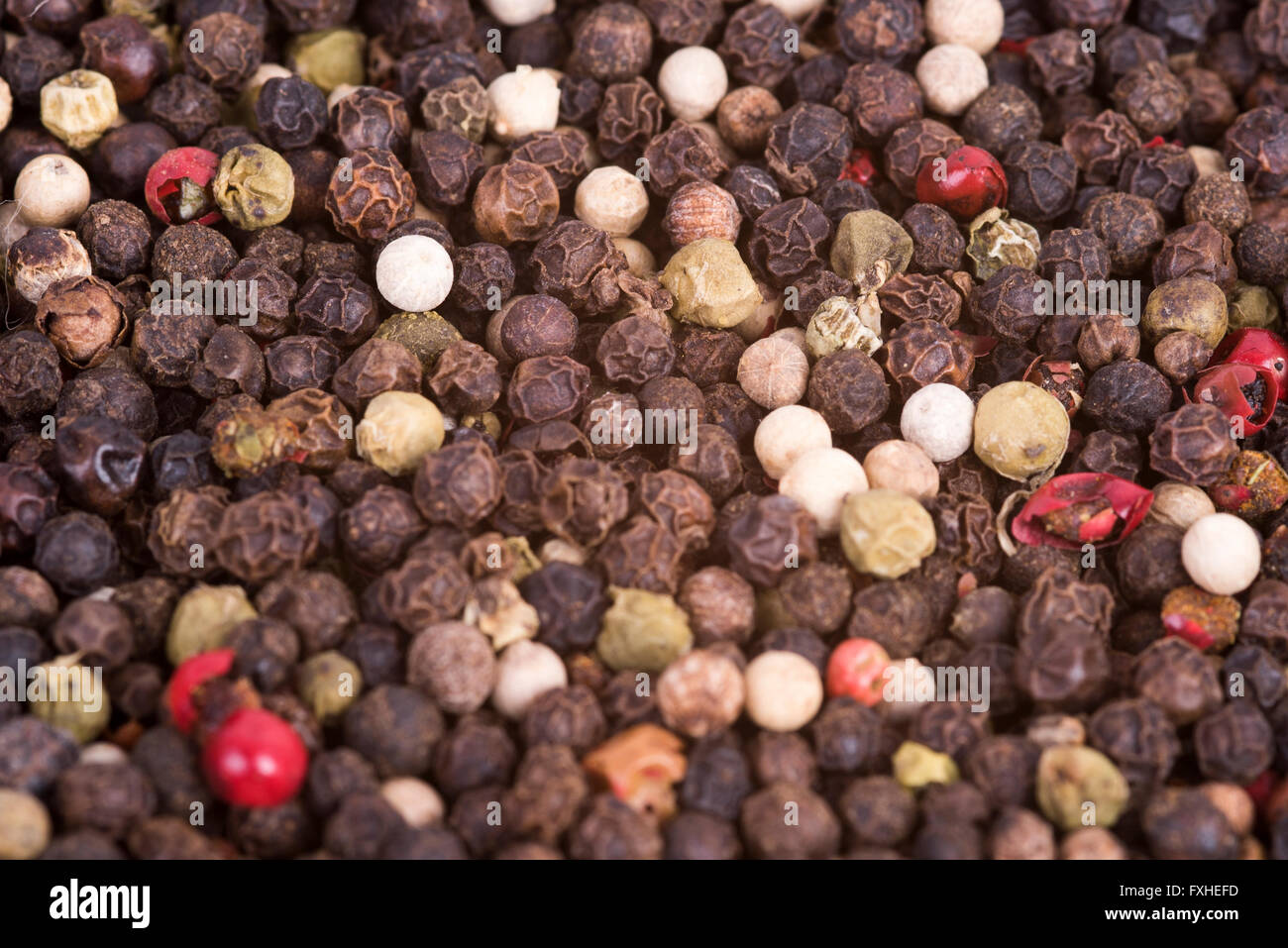 a picture of colorful peppercorns Stock Photo - Alamy