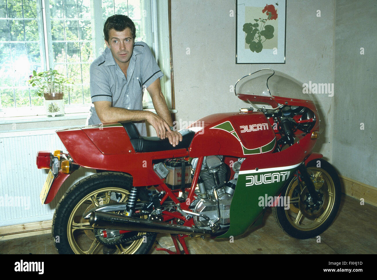 London. UK. ARCHIVE. Lewis Collins in the mid 1980s at his home and ...