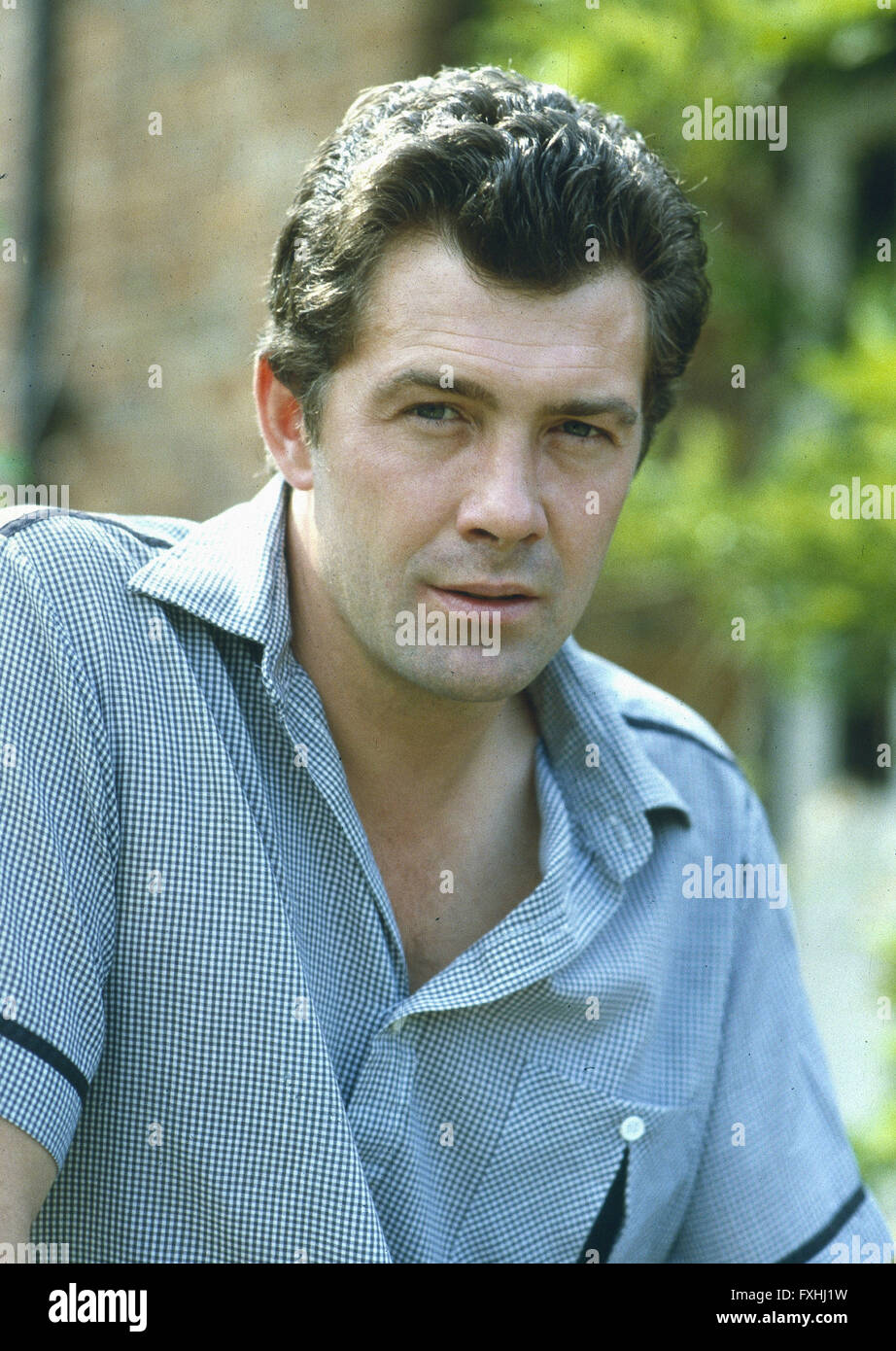 London. UK. ARCHIVE. Lewis Collins in the mid 1980s at his home and ...