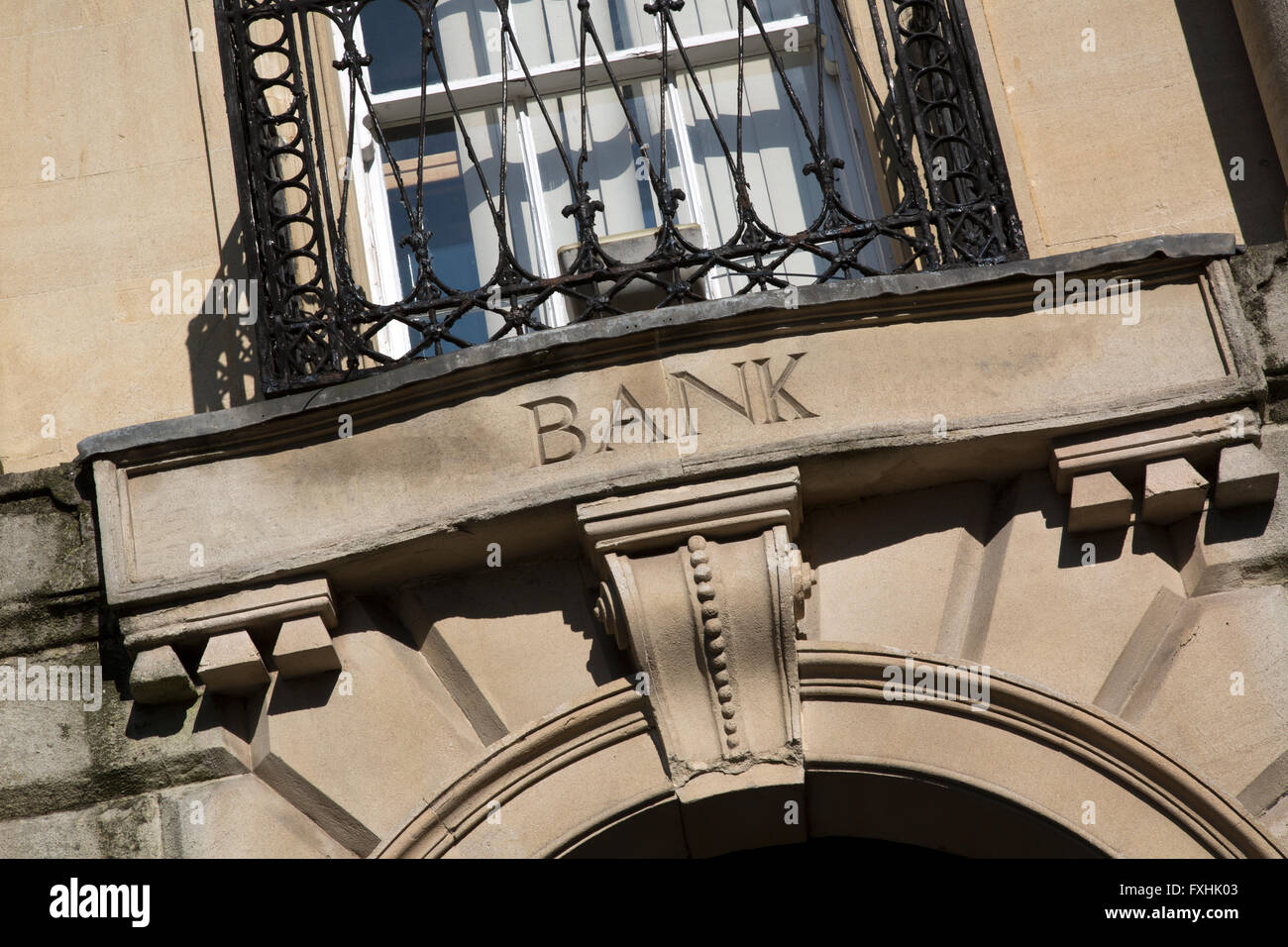 Bank Sign on Stone Facade Stock Photo - Alamy