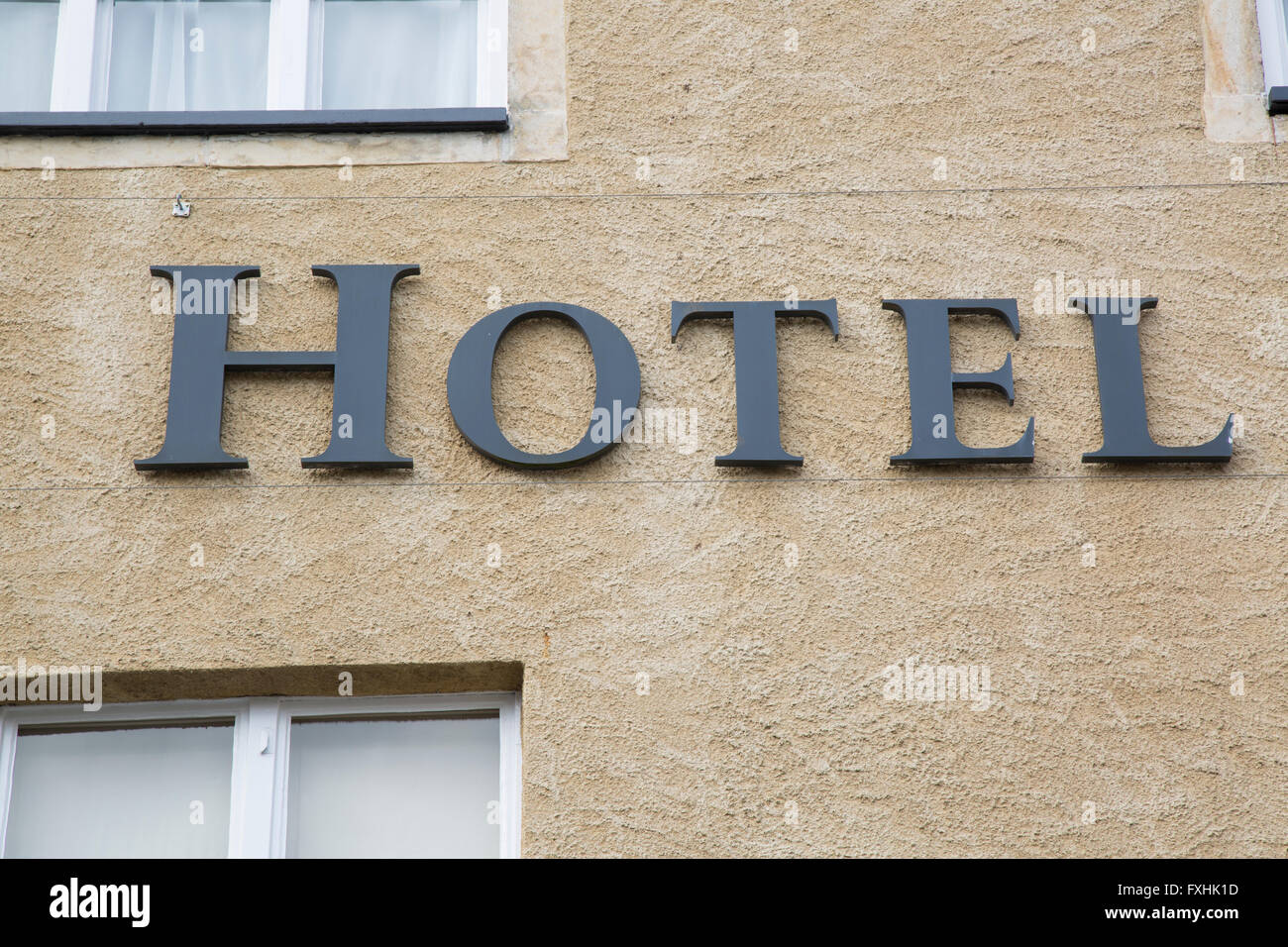 Hotel Sign on Building Facade Stock Photo - Alamy