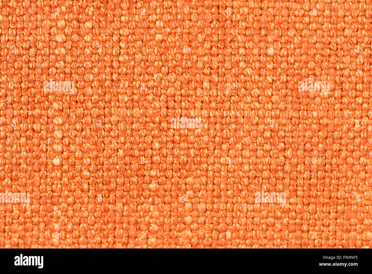 Closeup detail of orange fabric texture background Stock Photo - Alamy