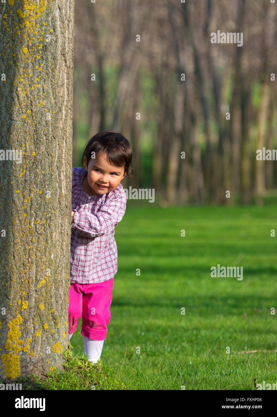 Girl Hiding Behind Tree Clipart